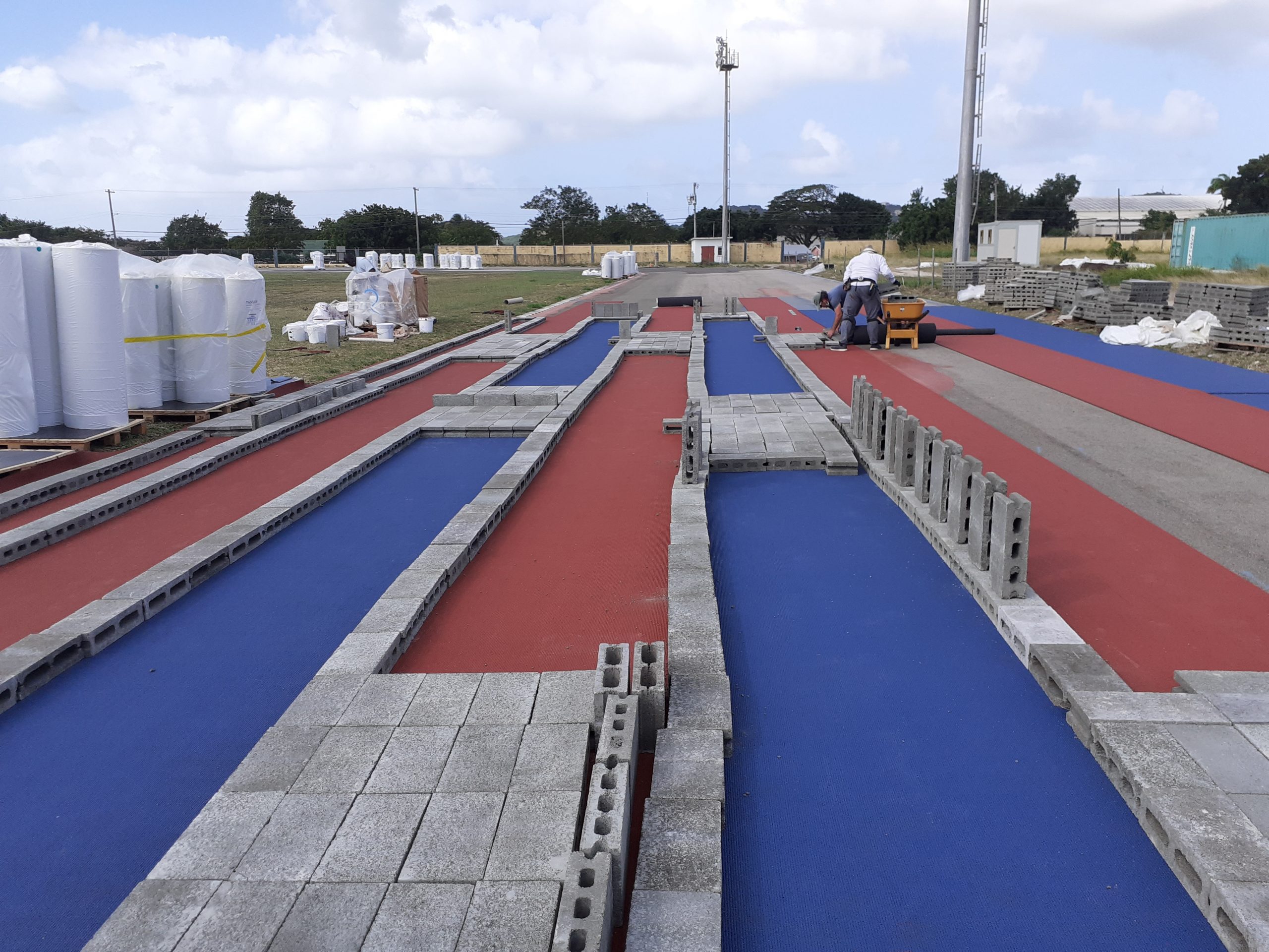 Let the laying of the surface commence – Caribcast